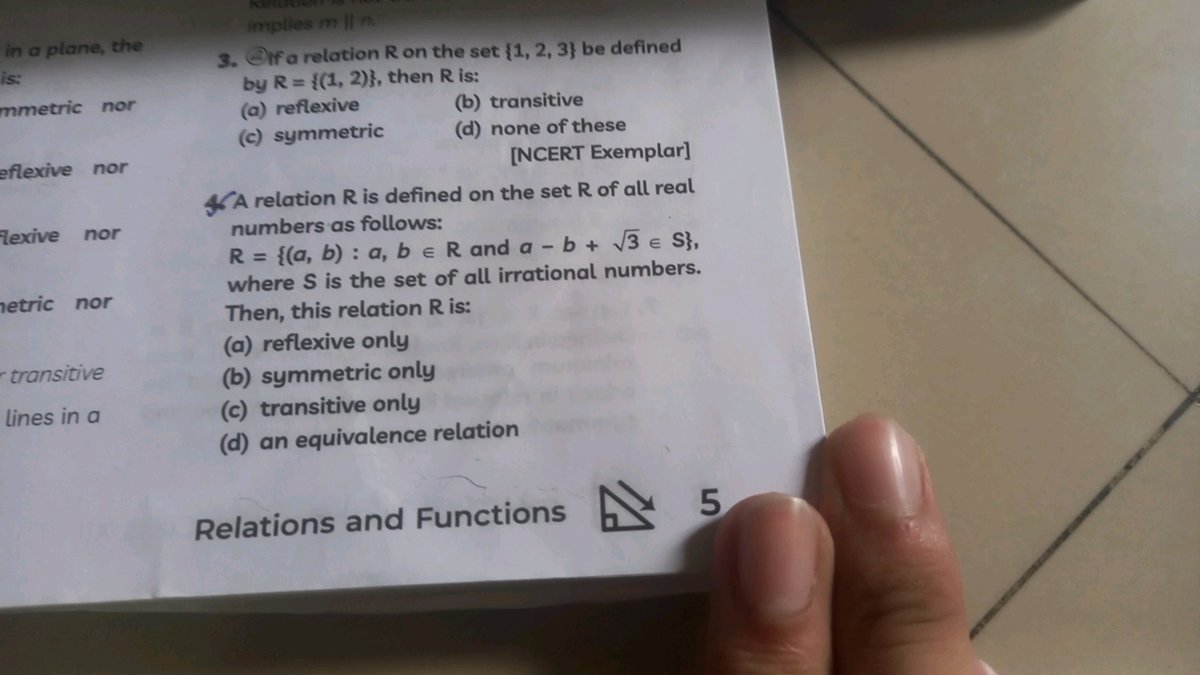 A relation R is defined on the set R of all real numbers as follows: R