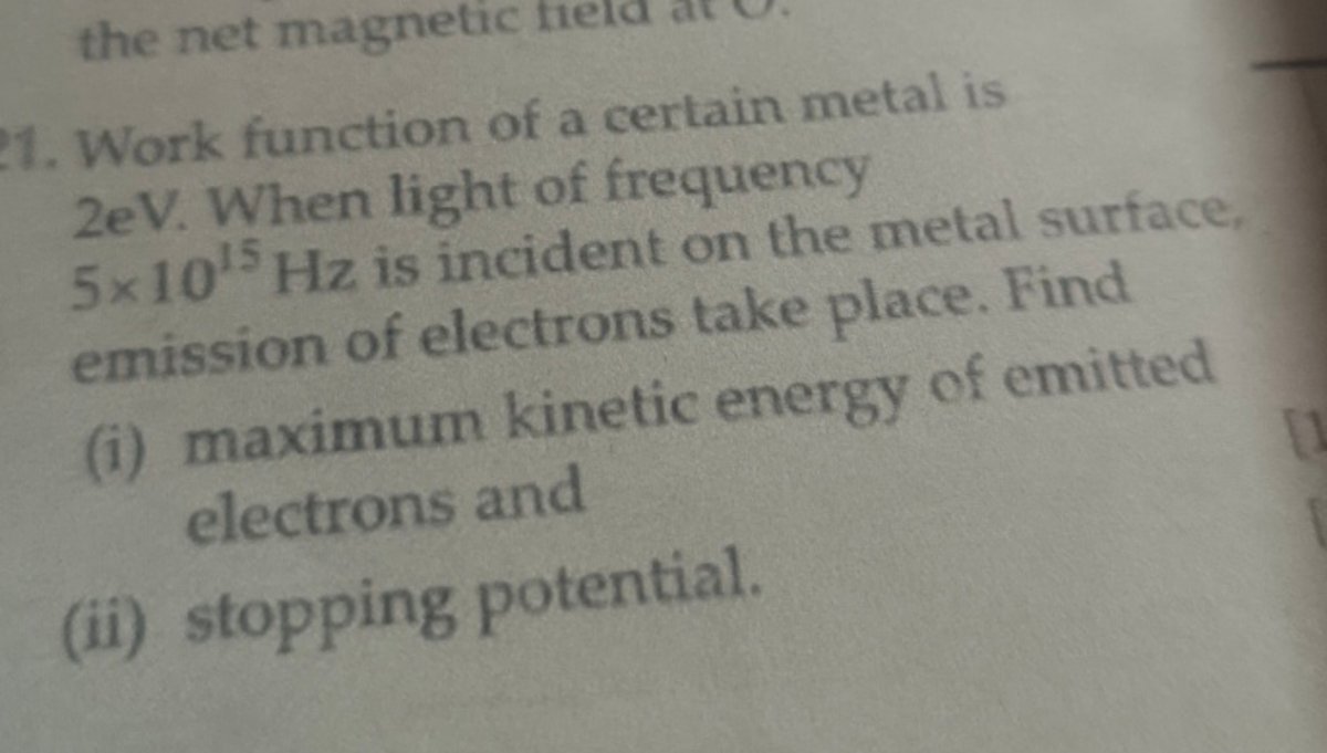 Work function of a certain metal is 2 eV . When light of frequency 5 \tim..