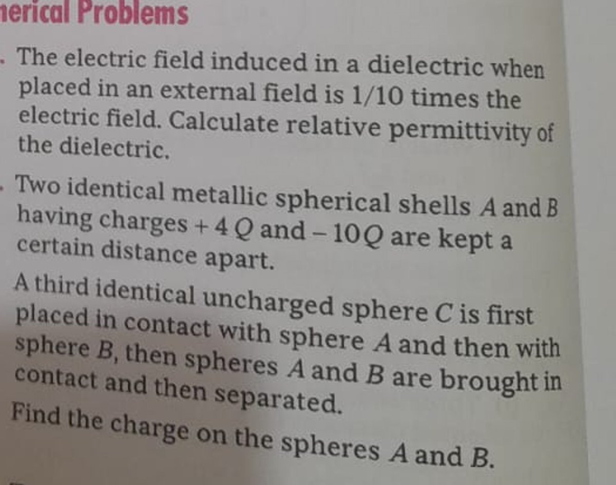 Two identical metallic spherical shells A and B carry charges +4Q and –10..