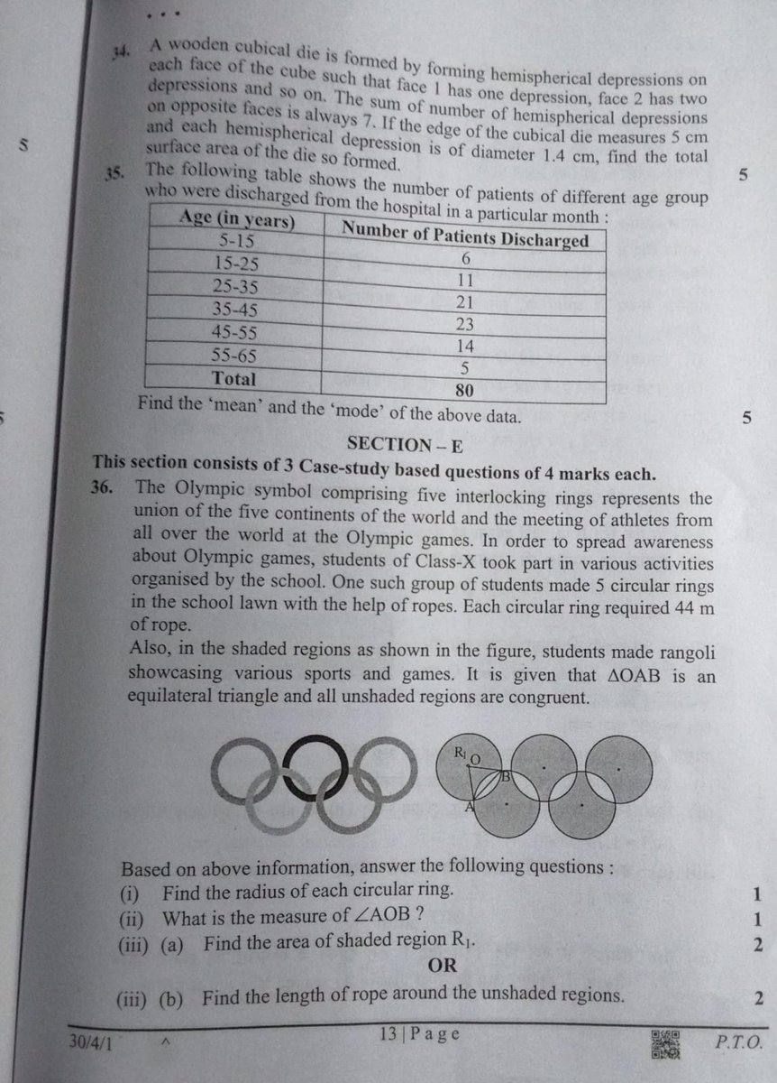 A wooden cubical die is formed by forming hemispherical depressions on ea..