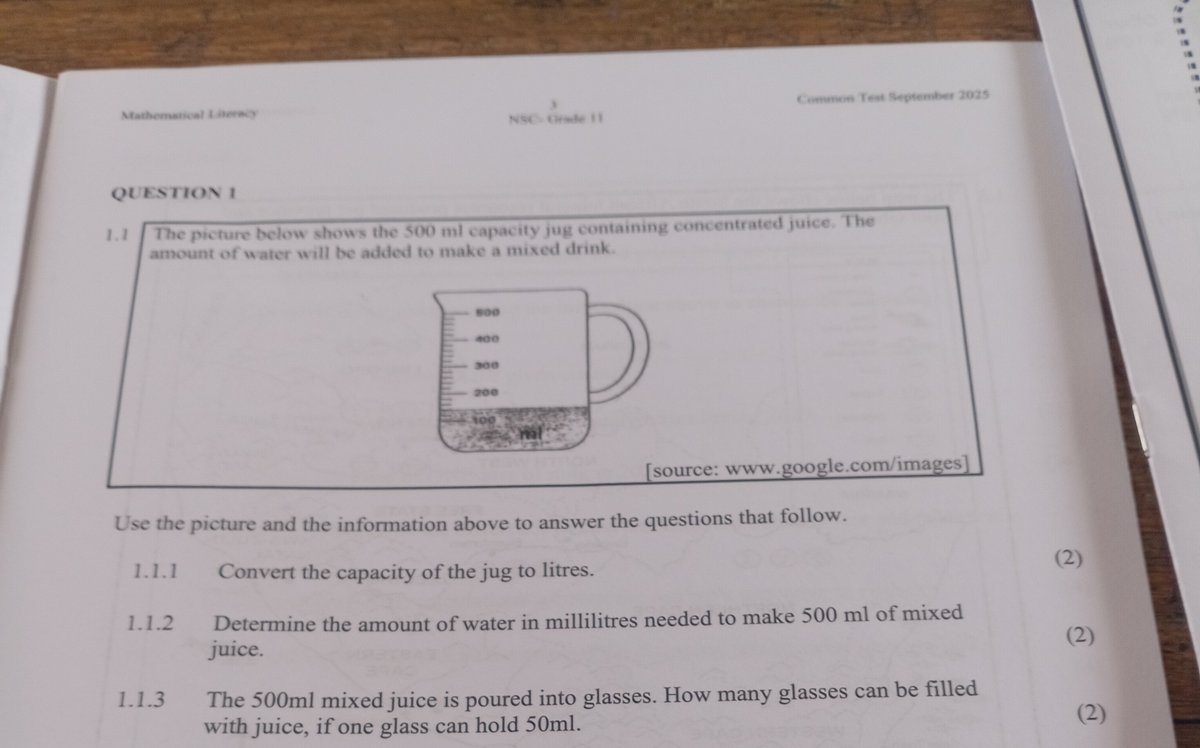 Question 1 1.1 The picture below shows the 500 ml capacity jug containin..