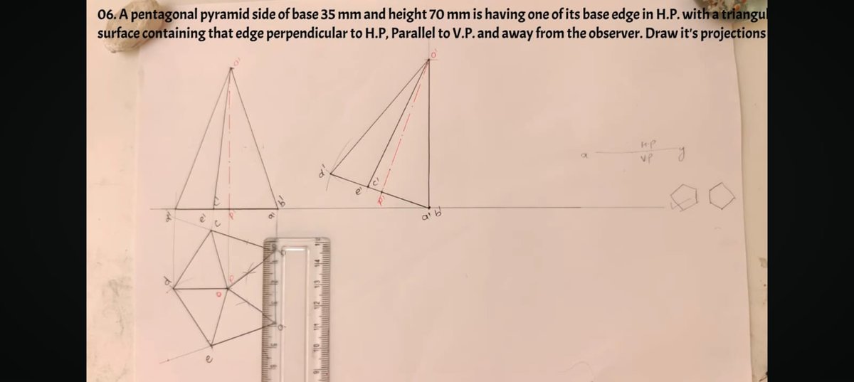 A pentagonal pyramid side of base 35 mm and height 70 mm is having one of..