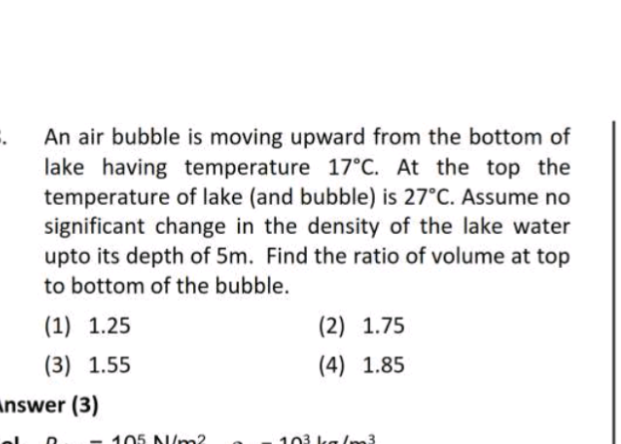 An air bubble is moving upward from the bottom of a lake where the temper..