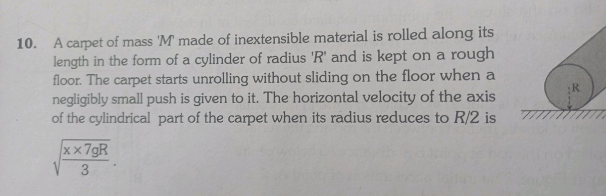 A carpet of mass ' M ' made of inextensible material is rolled along its