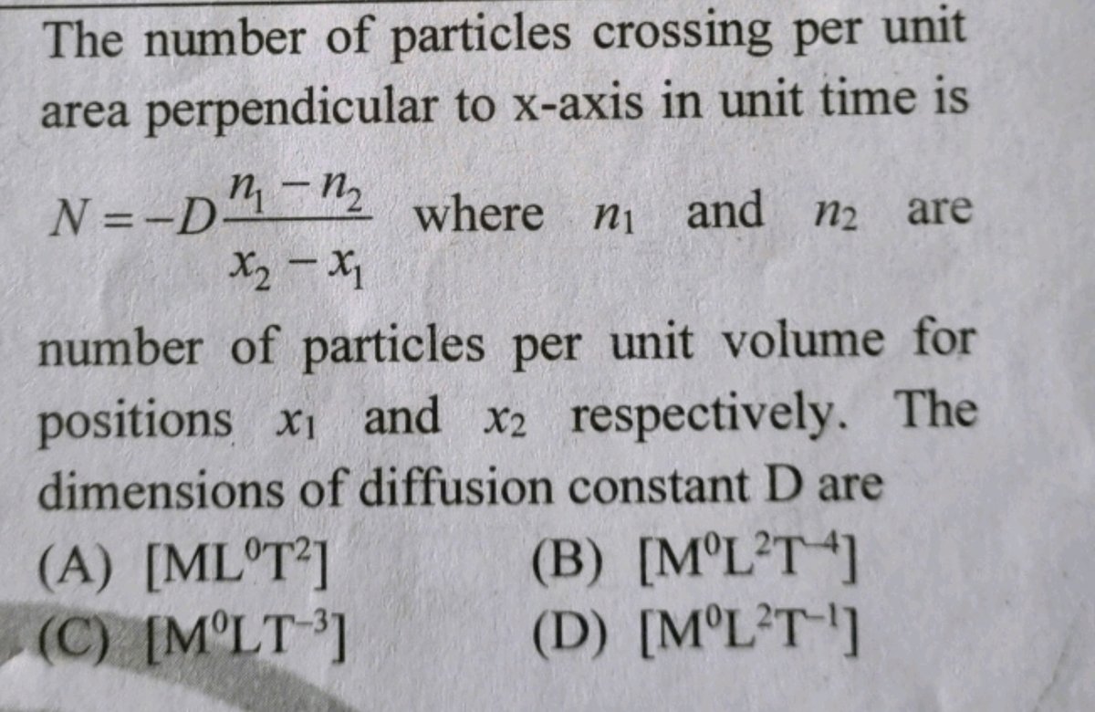 The number of particles crossing per unit area perpendicular to x-axis in..