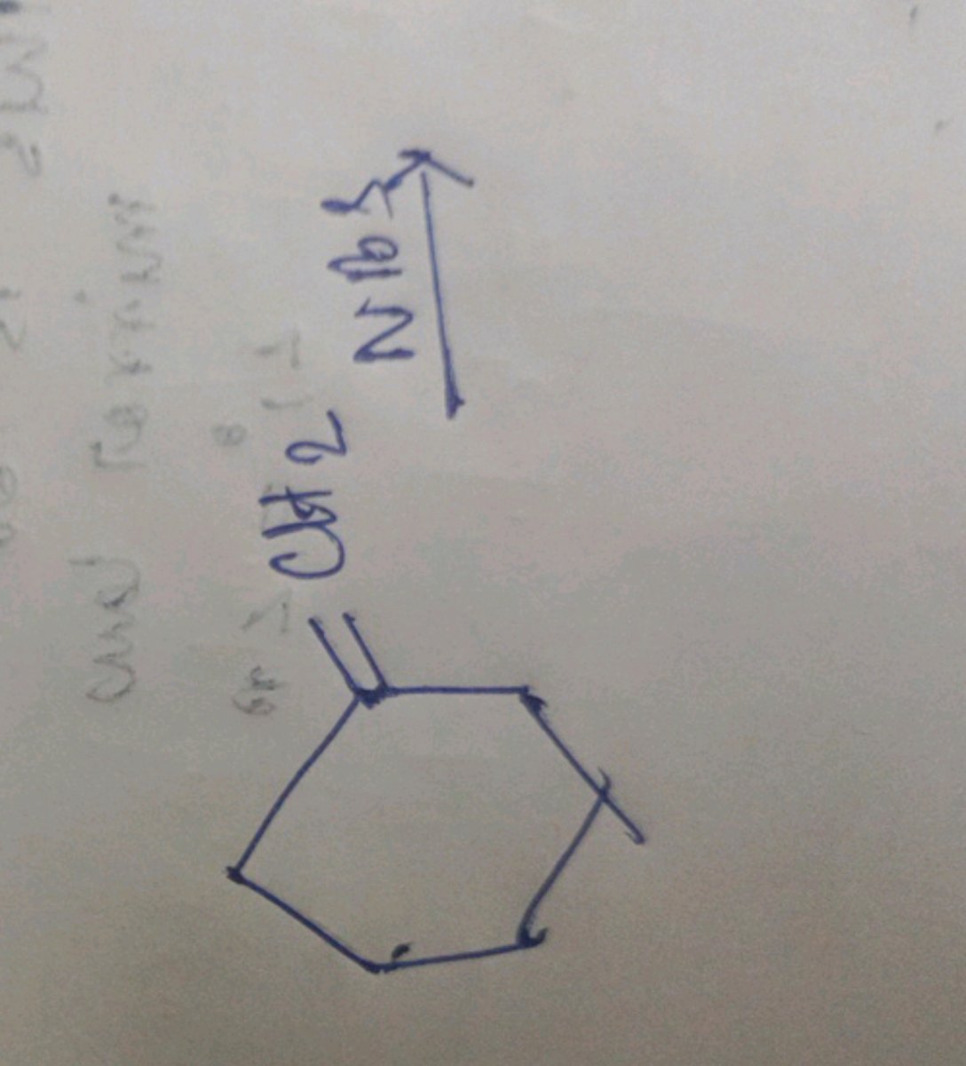 The image shows a chemical reaction. Identify the product of the reaction..