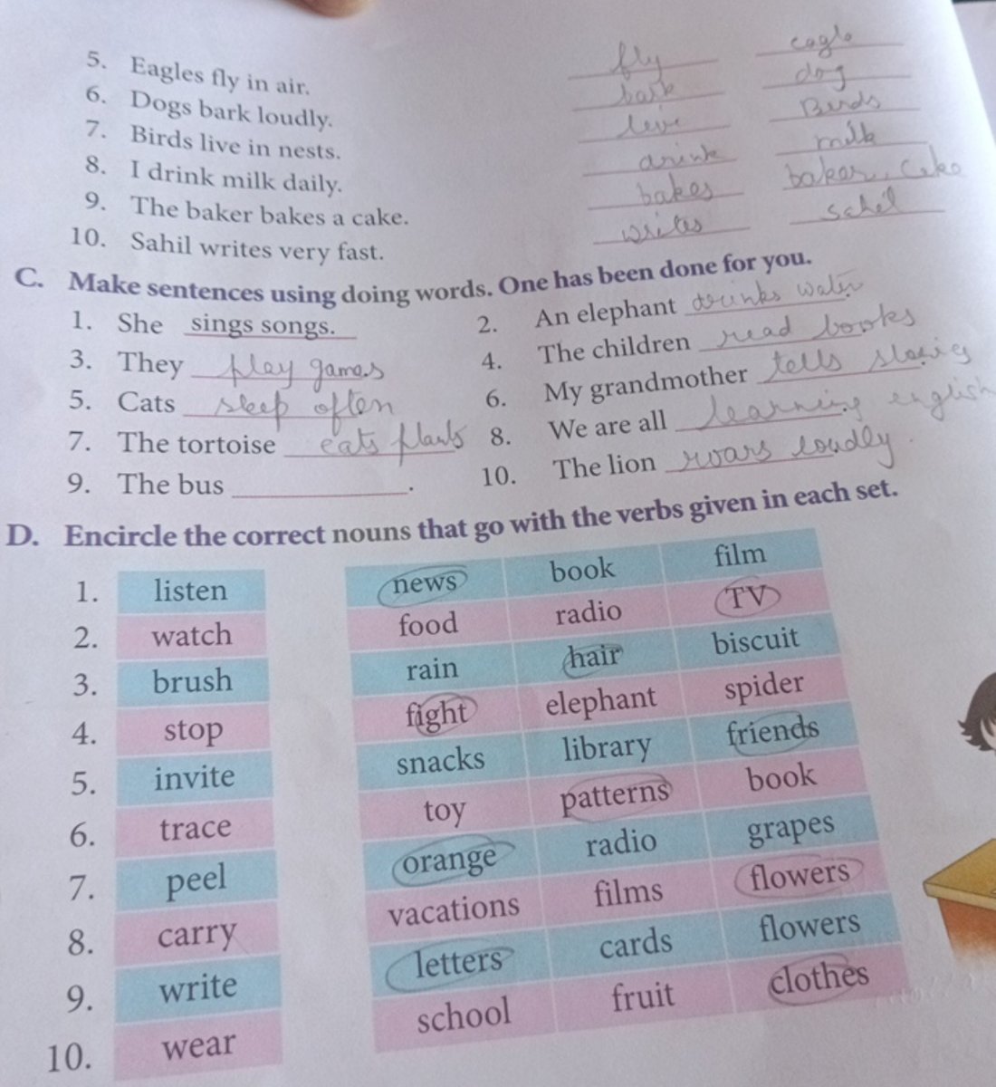 C. Make sentences using doing words. One has been done for you. She sings..
