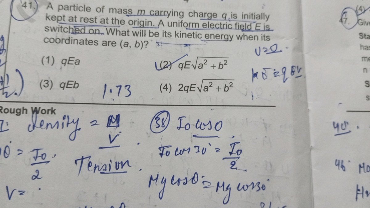 41.) A particle of mass m carrying charge q, is initially kept at rest at..