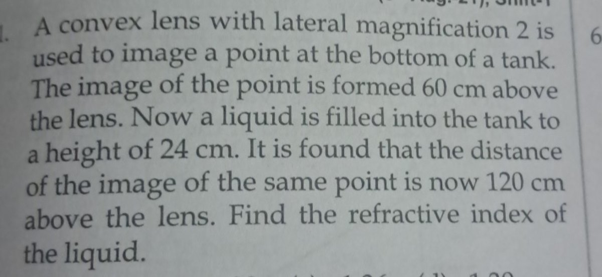 A convex lens with lateral magnification 2 is used to image a point at th..