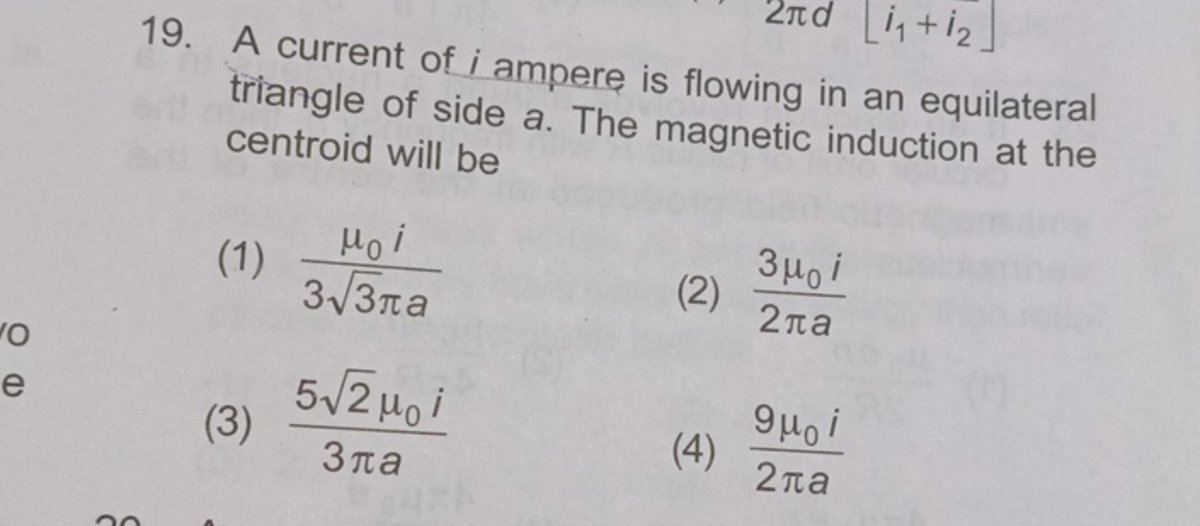 A current of i ampere is flowing in an equilateral triangle of side a. Th..