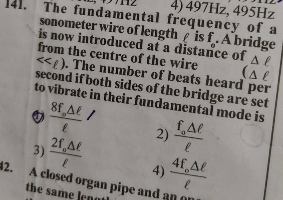 The fundamental frequency of a sonometer wire of length l is f_0. A bridg..