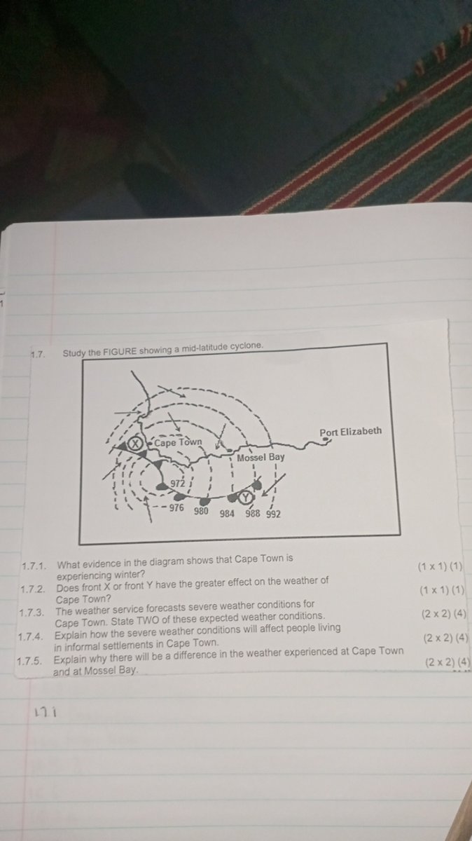 1.7. Study the FIGURE showing a mid-latitude cyclone. [Diagram showing a..