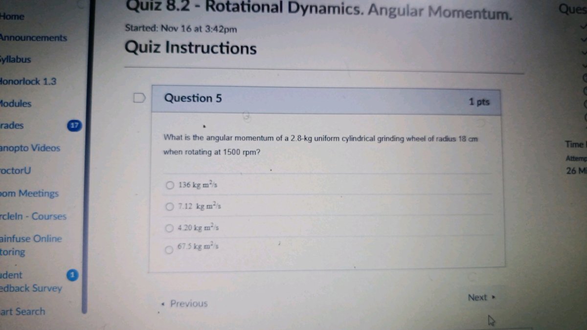 What is the angular momentum of a 2.8-kg uniform cylindrical grinding whe..