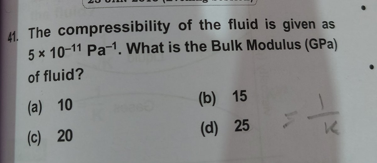 The compressibility of the fluid is given as 5 \times 10^{-11} \text{ Pa}..
