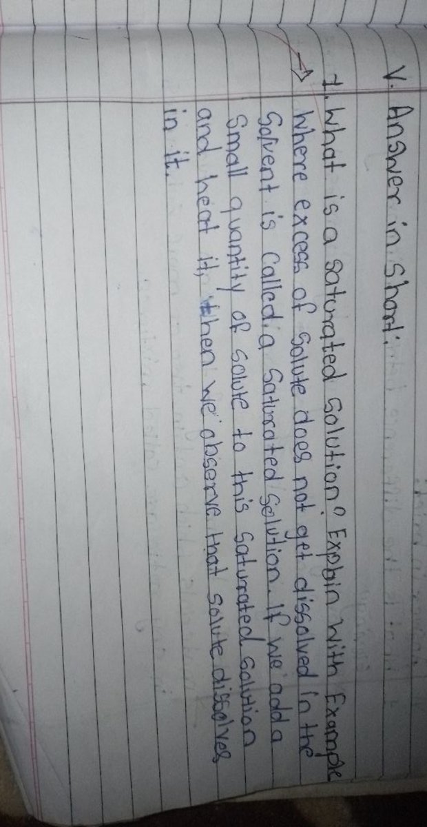 What is a saturated solution? Explain with an example. Where excess of s..