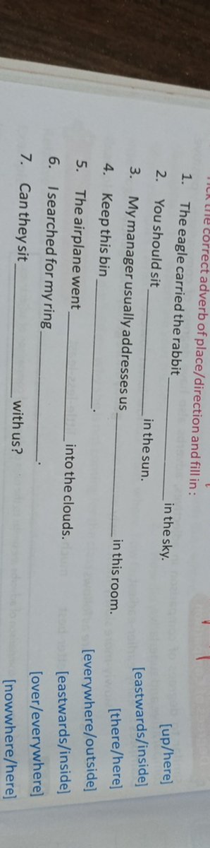 Tick the correct adverb of place/direction and fill in: The eagle carrie..