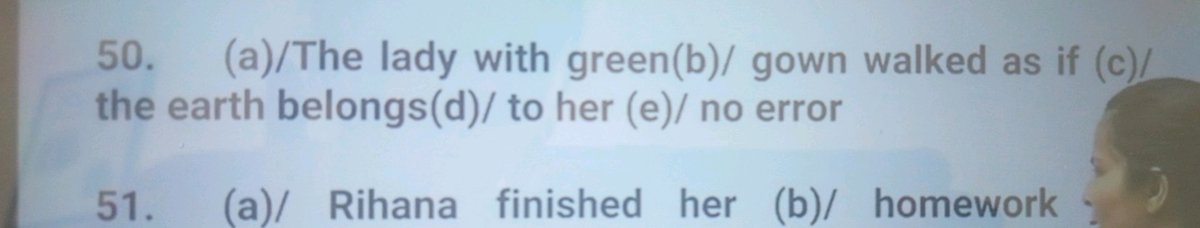 (a)/The lady with green(b)/ gown walked as if (c)/ the earth belongs(d)/