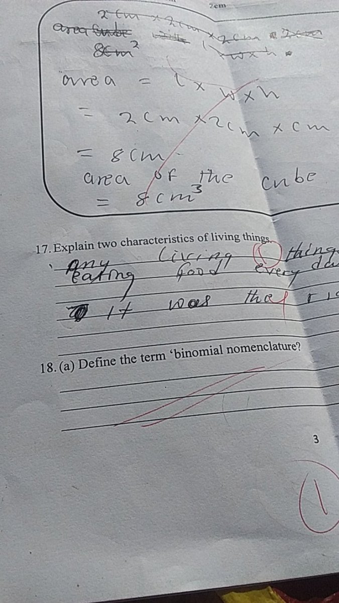 Explain two characteristics of living things. (a) Define the term 'binom..
