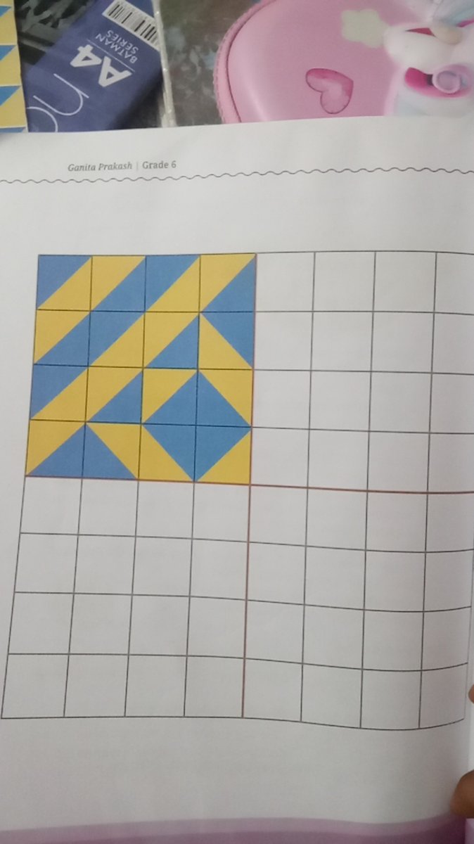 The image shows a grid with a pattern of blue and yellow triangles in som..
