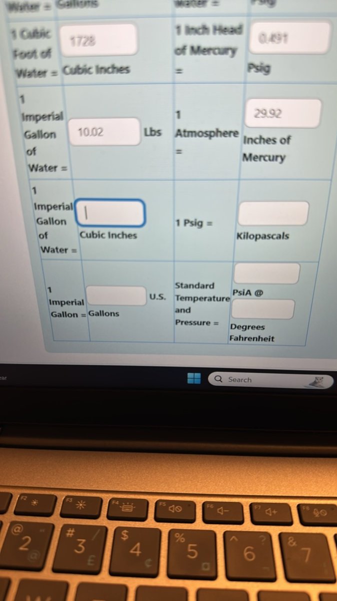 The image displays a table with various unit conversions and physical con..