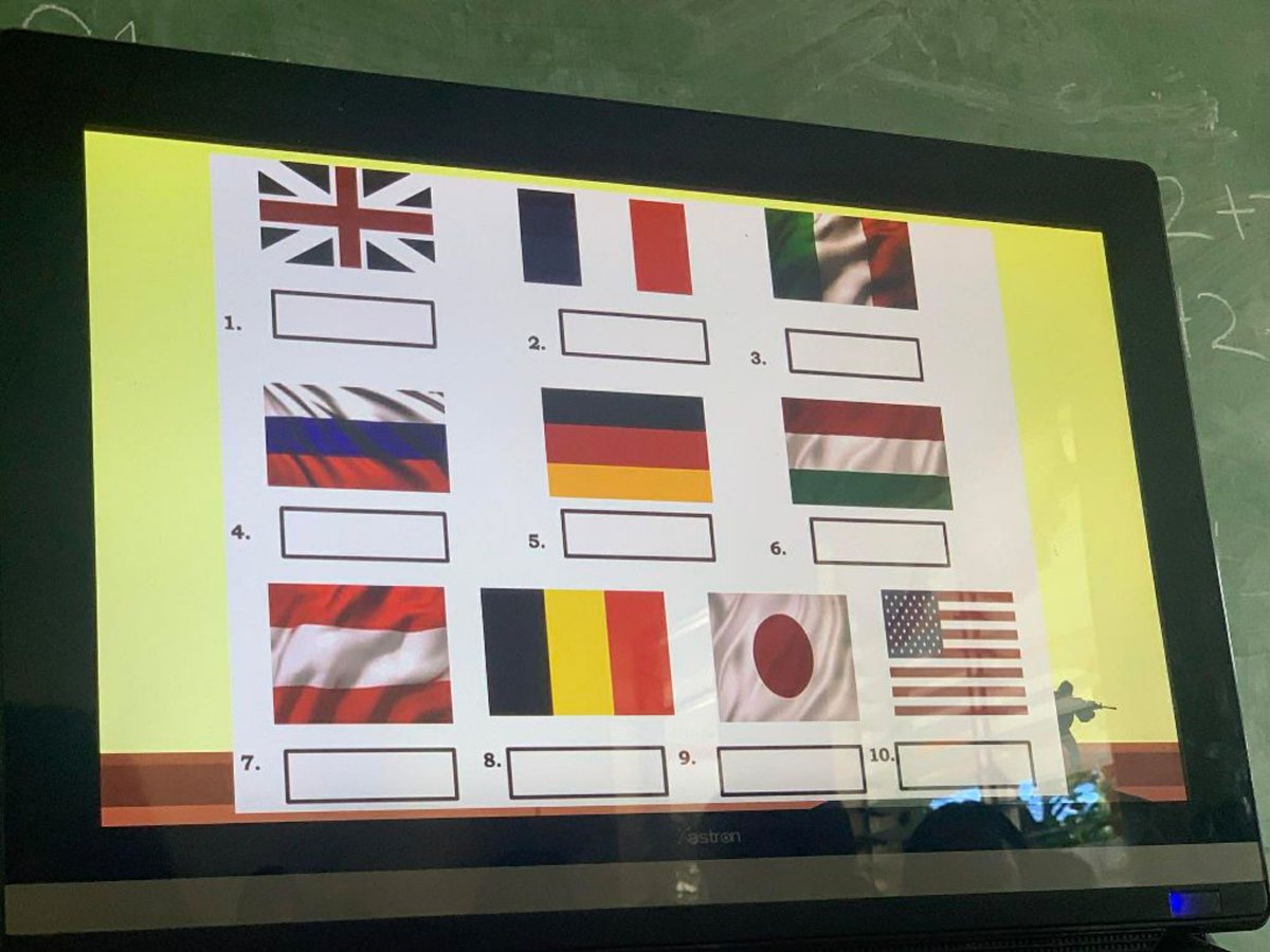 Identify the countries represented by the following flags: Flag of the U..