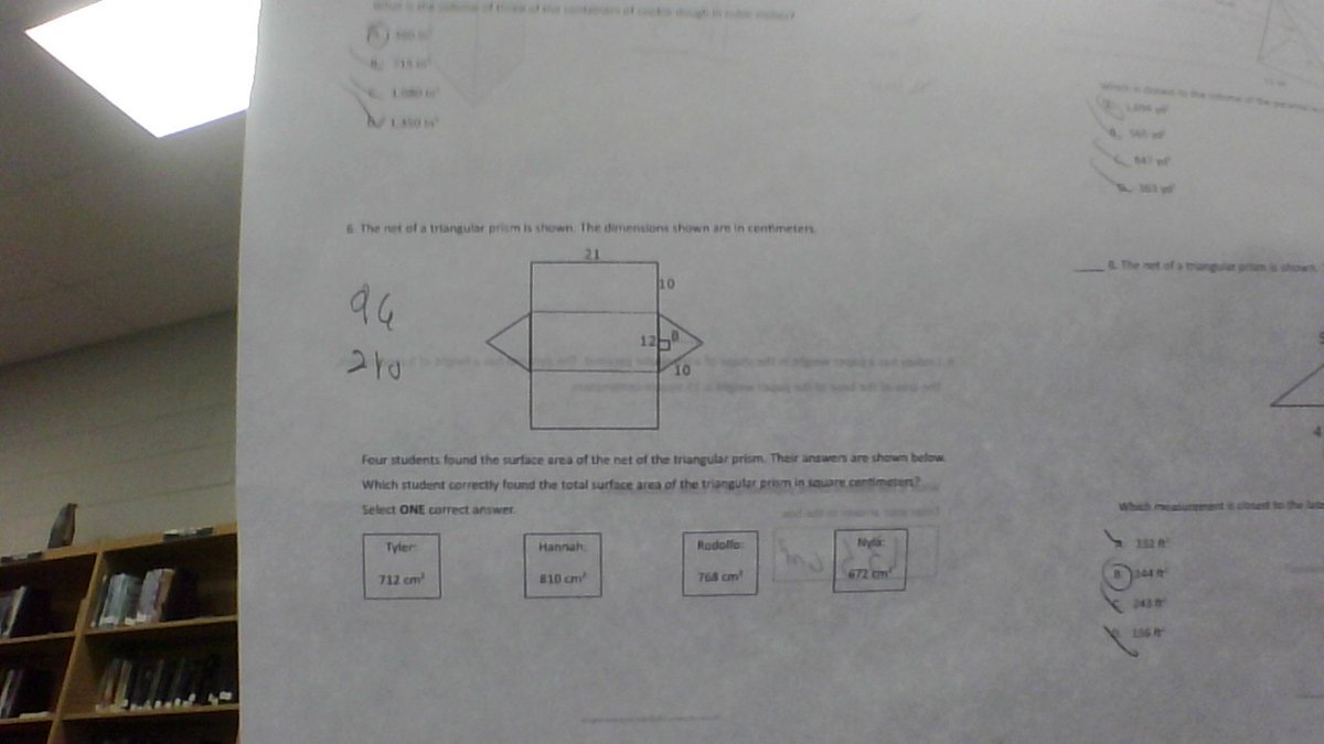 The net of a triangular prism is shown. The dimensions shown are in centi..