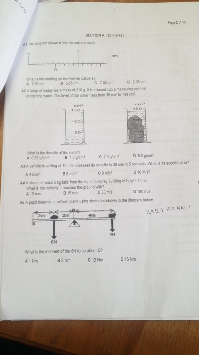 SECTION A: [20 marks] A1 The diagram shows a Vernier calipers scale. Wha..