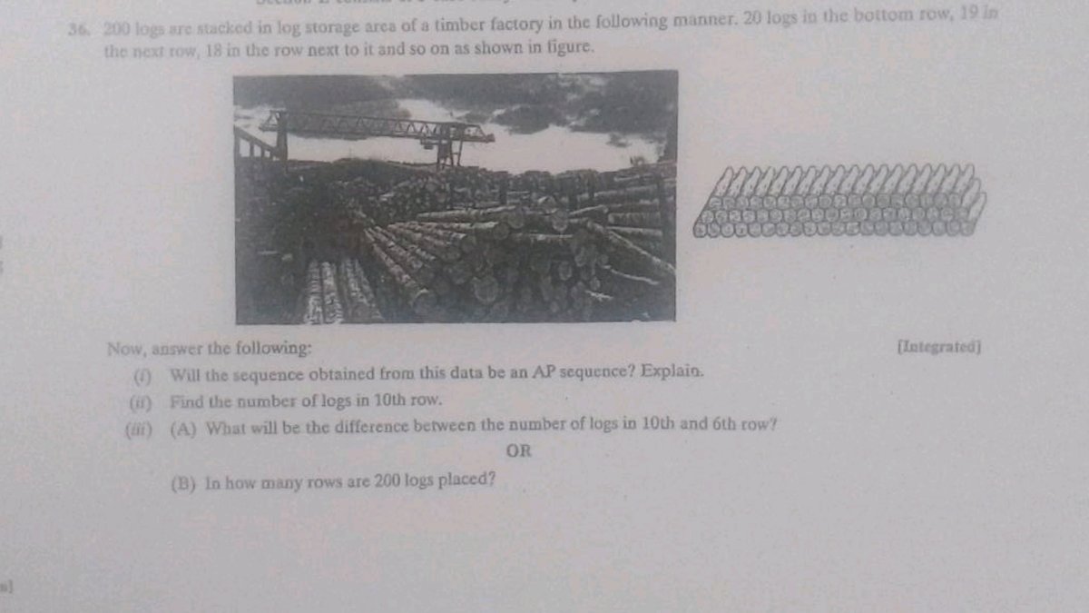200 logs are stacked in log storage area of a timber factory in the follo..