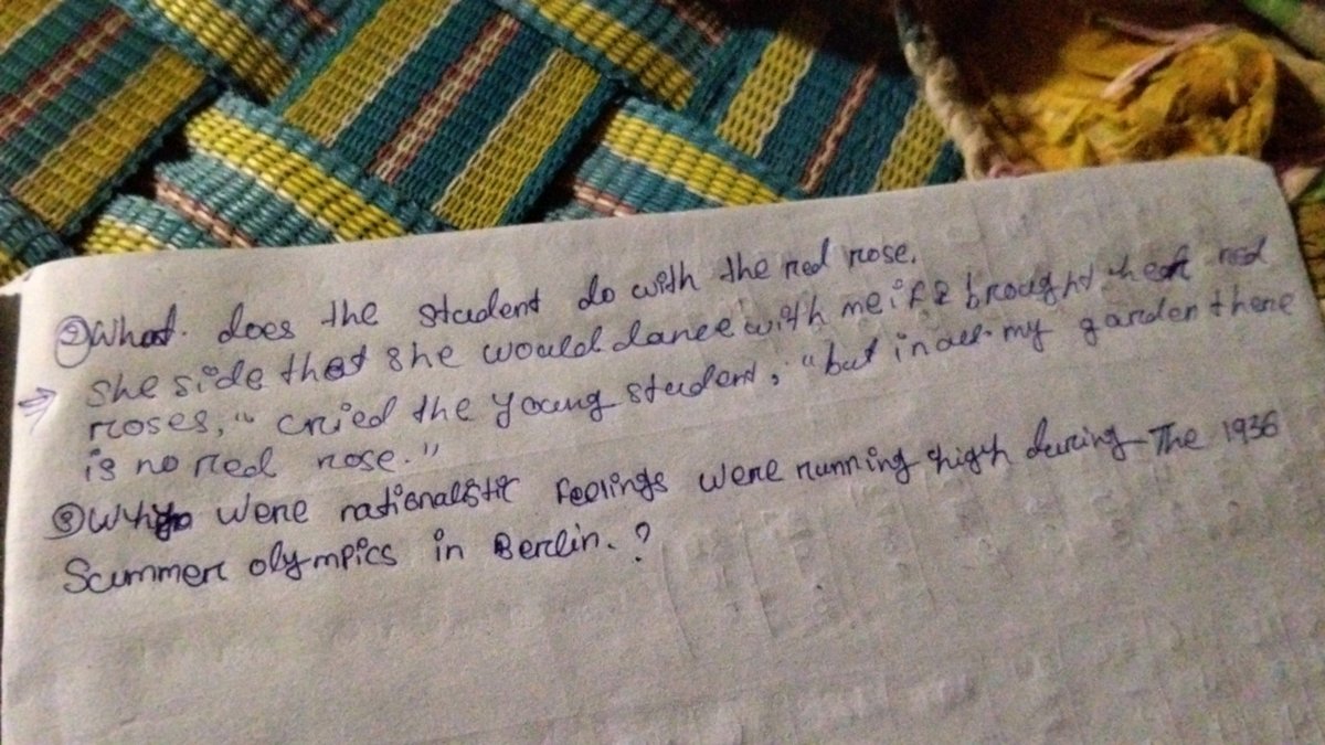 What does the student do with the red rose? She said that she would da..