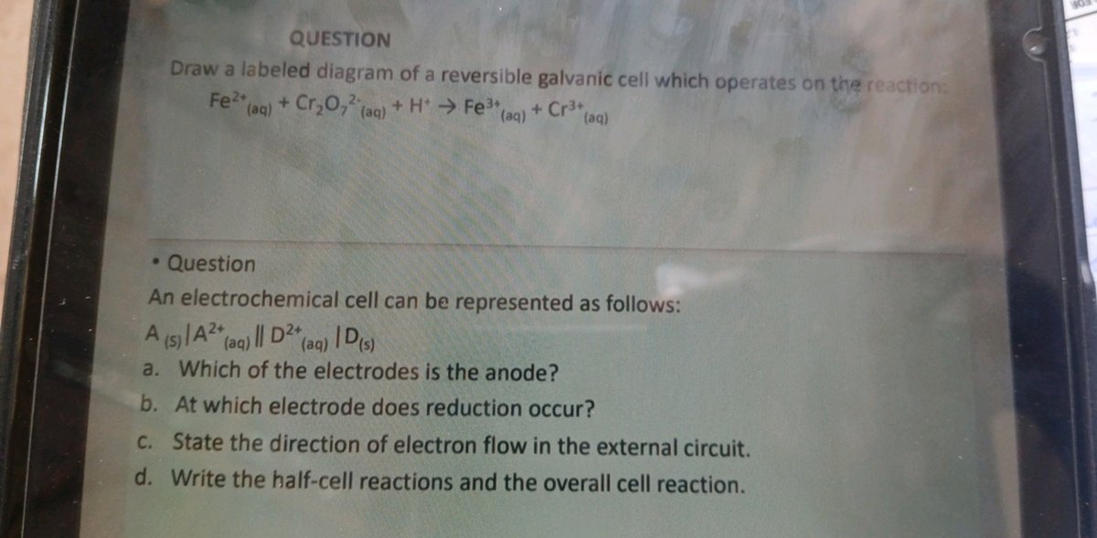 QUESTION Draw a labeled diagram of a reversible galvanic cell which opera..