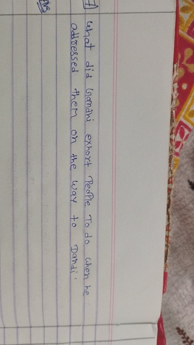 What did Gandhi exhort people to do when he addressed them on the way to
