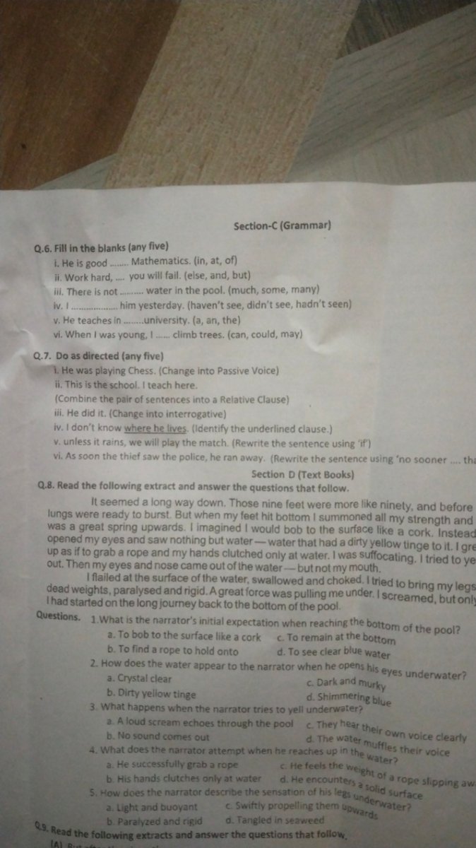 Q.6. Fill in the blanks (any five) i. He is good....... Mathematics. (in,..