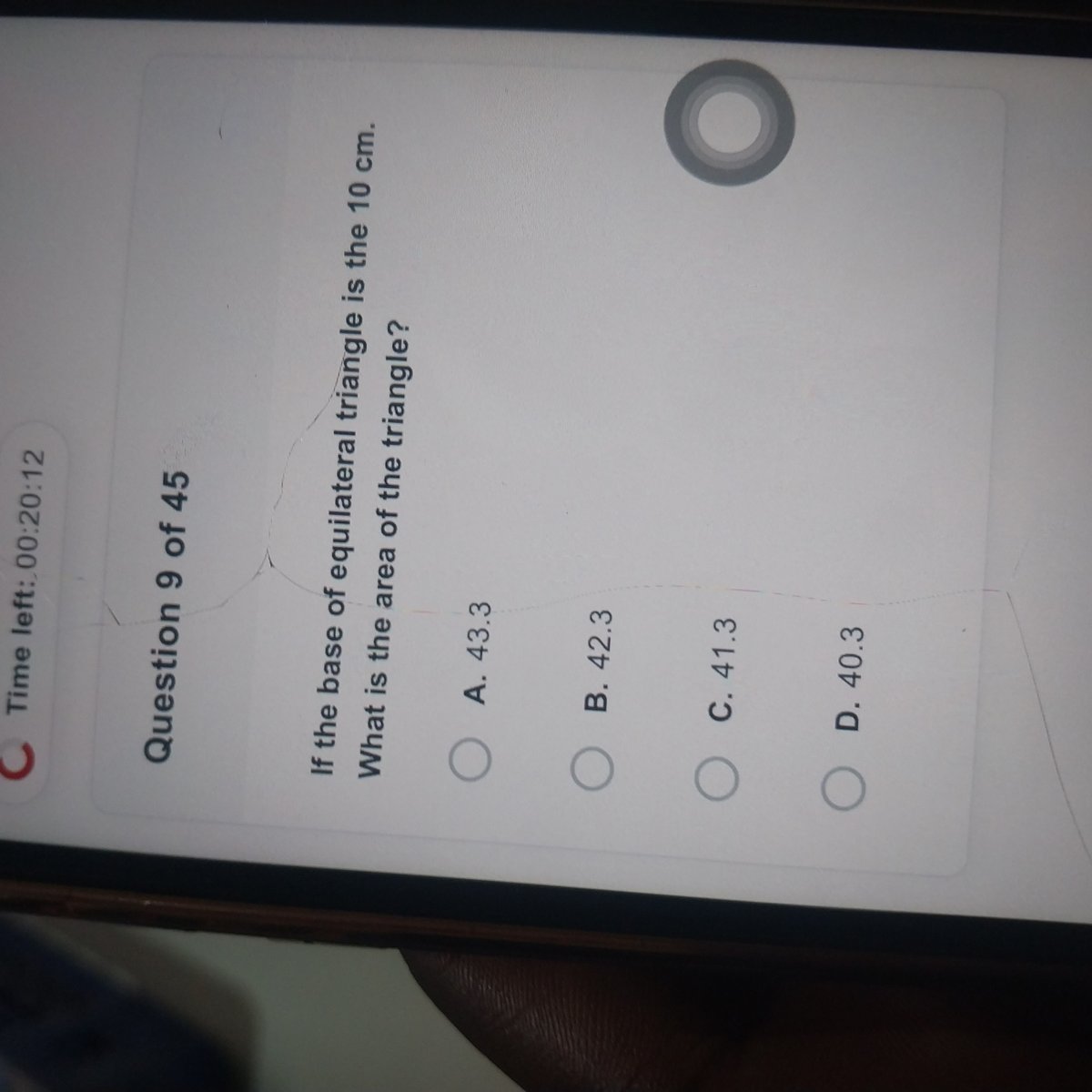 If the base of an equilateral triangle is 10 cm, what is the area of the