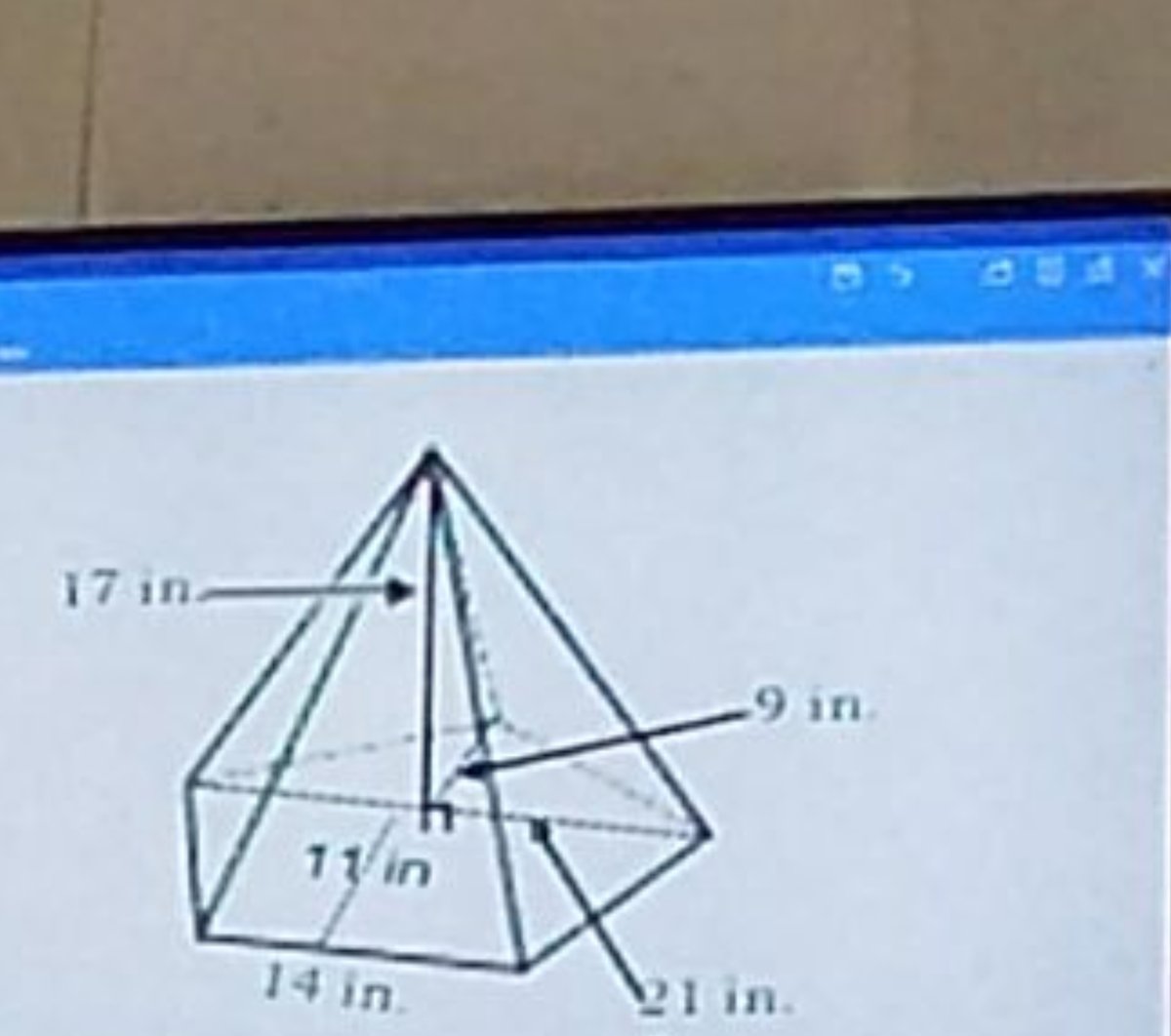 The image shows a pyramid with a rectangular base. The dimensions provide..