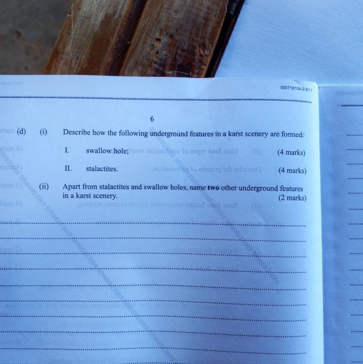 (d) (i) Describe how the following underground features in a karst scener..