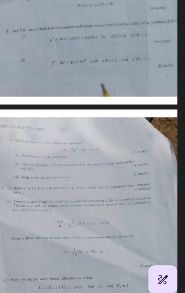 (a) Use the method of undetermined coefficients to solve the following in..
