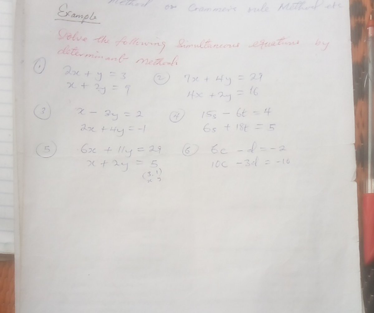 Solve the following simultaneous equations by determinant methods: 2x