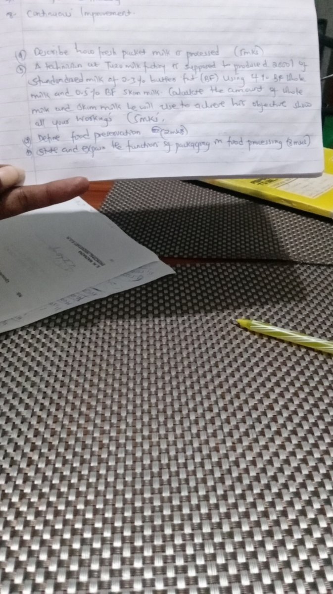Describe how fresh packet milk is processed. (1 mark) A technician at Tuz..