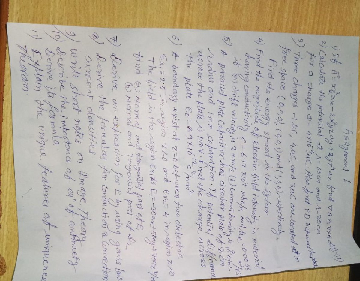 Assignment 1 1) If A = x³ax - 2xyzay + zyz az, find ∇A & ∇x A at (1,-1,1..