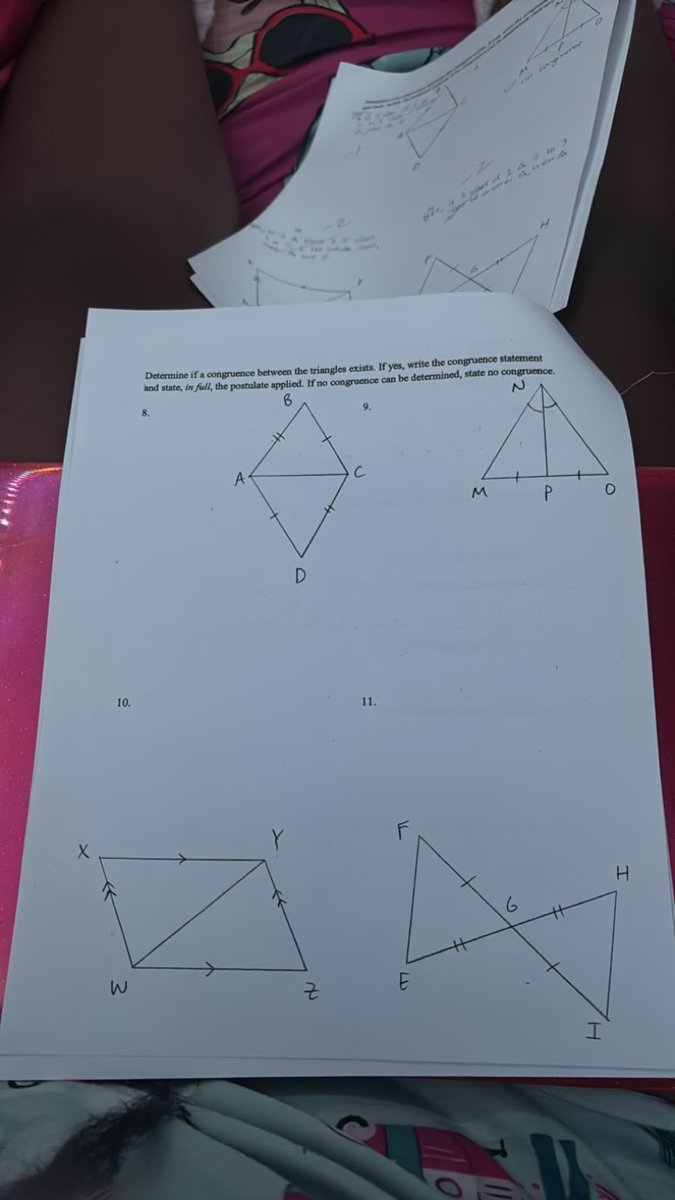 Determine if a congruence between the triangles exists. If yes, write the..