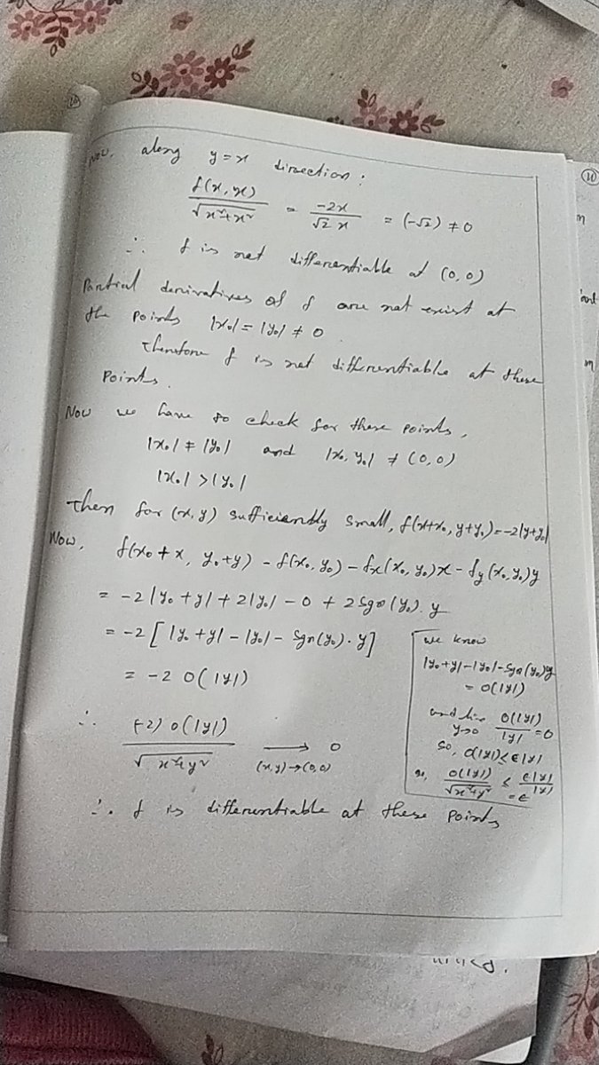 The provided image contains a handwritten solution to a problem involving..