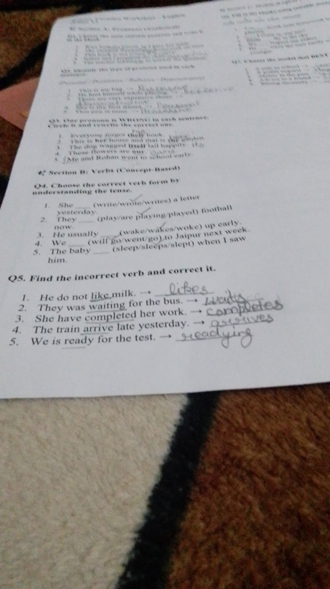 Q4. Choose the correct verb form by understanding the tense. She __ (writ..
