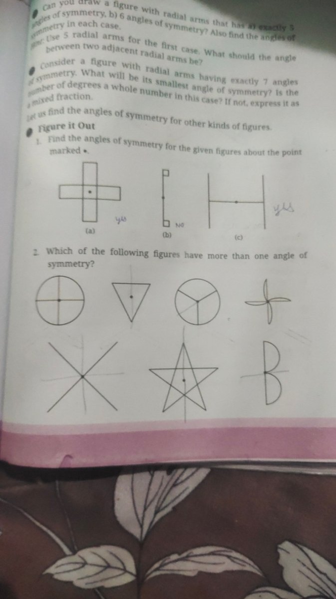 Find the angles of symmetry for the given figures about the point marked...