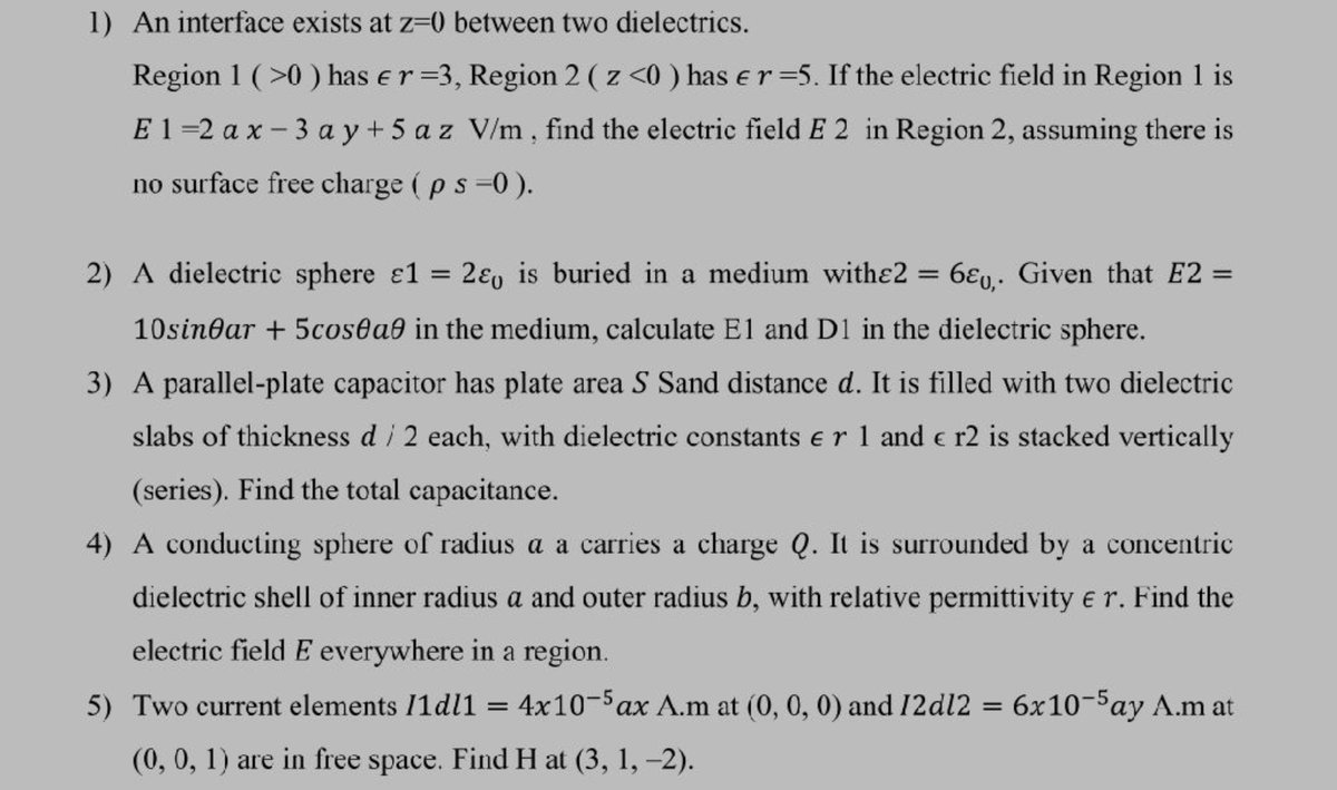 1) An interface exists at z=0 between two dielectrics. Region 1 (z > 0) h..