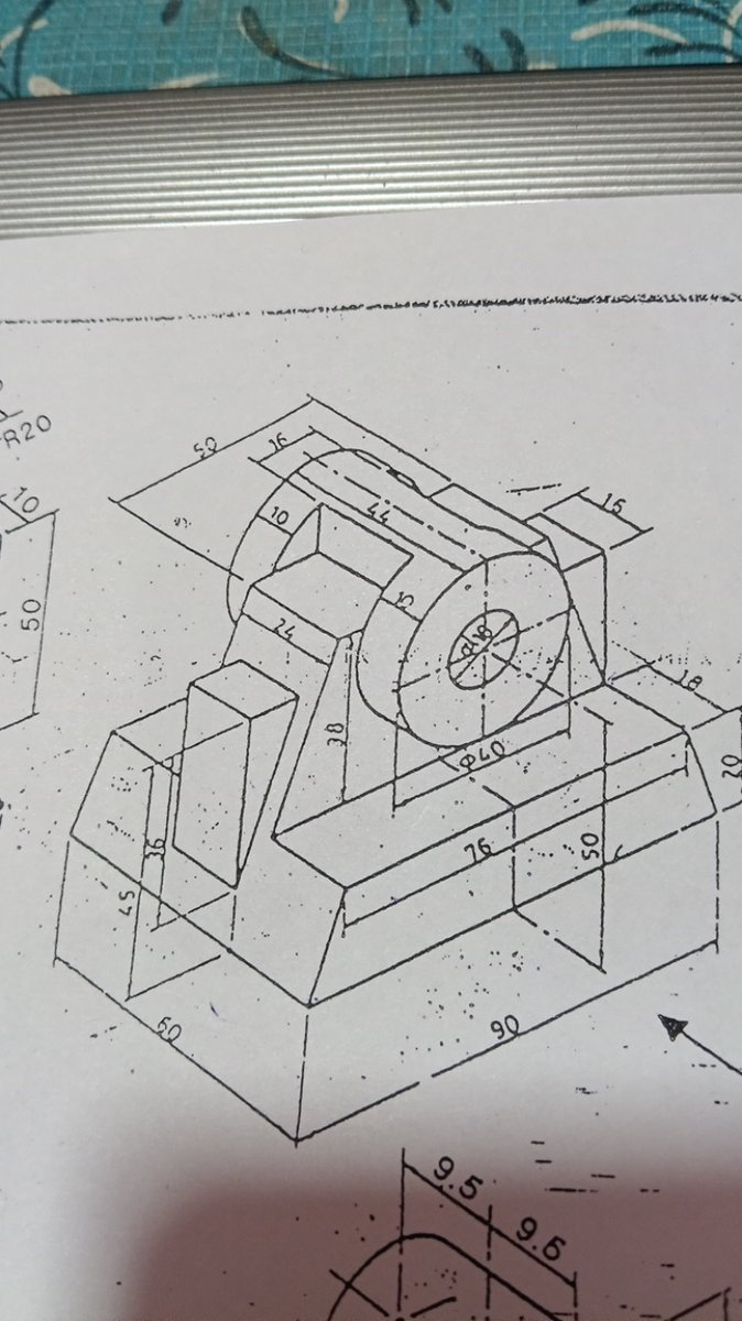 Draw the front, top, and right-side orthographic projections of the given..
