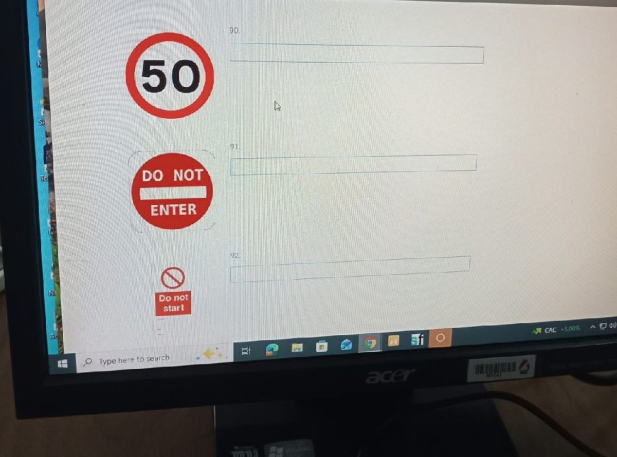 (Image shows three road signs: a speed limit sign for 50, a "DO NOT ENTER..