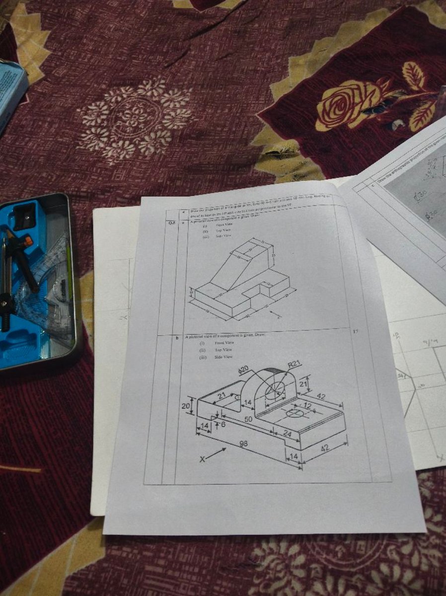 A pictorial view of a component is given. Draw: (i) Front View (ii) Top V..