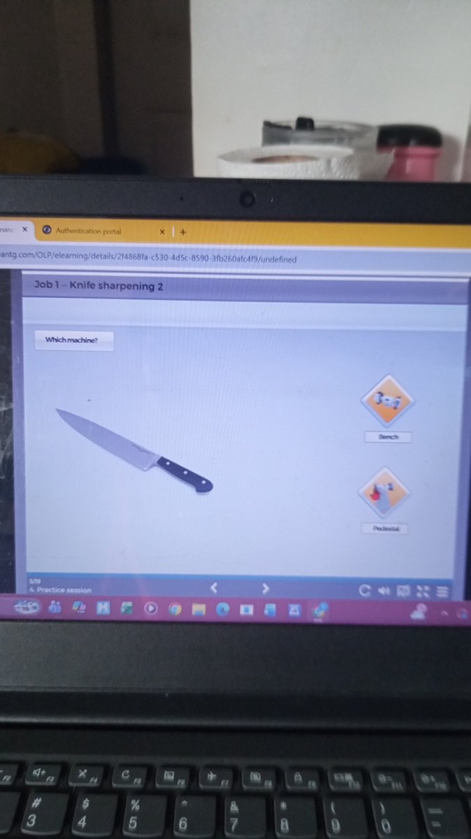Job 1 - Knife sharpening 2 Which machine? [Image of a knife] Options: