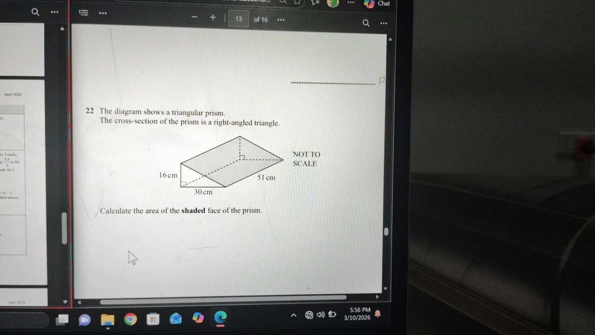 The diagram shows a triangular prism. The cross-section of the prism is a..