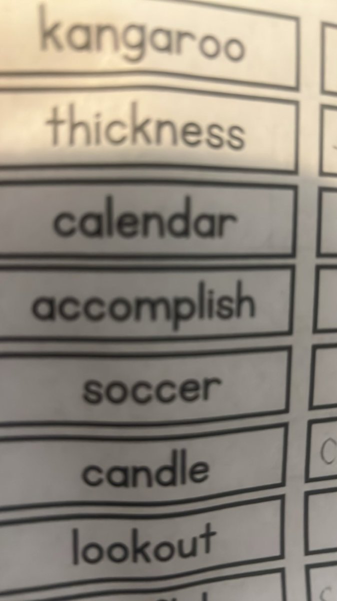 The image shows a list of words: kangaroo thickness calendar accomplish